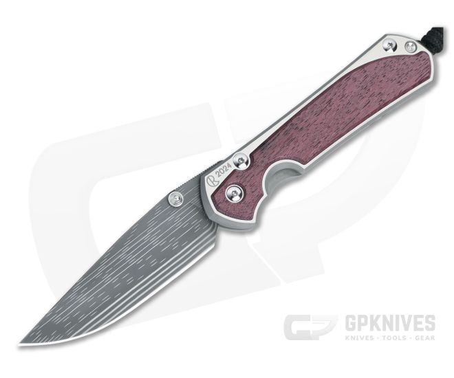 Chris Reeve Large Sebenza 31 Damascus 2024 Annual Purple Heart Wood